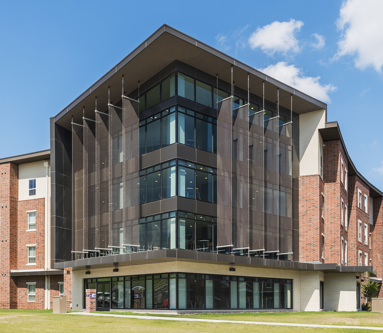 Coiled Wire Fabric Provides Solar Shading with an “Aged” Aesthetic