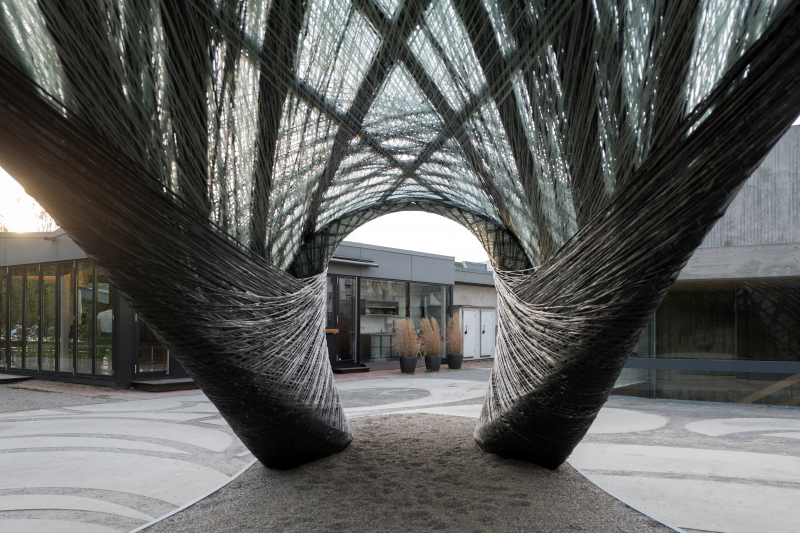 Larvae Silk-Inspired Pavilion Constructed by Robots and Drones